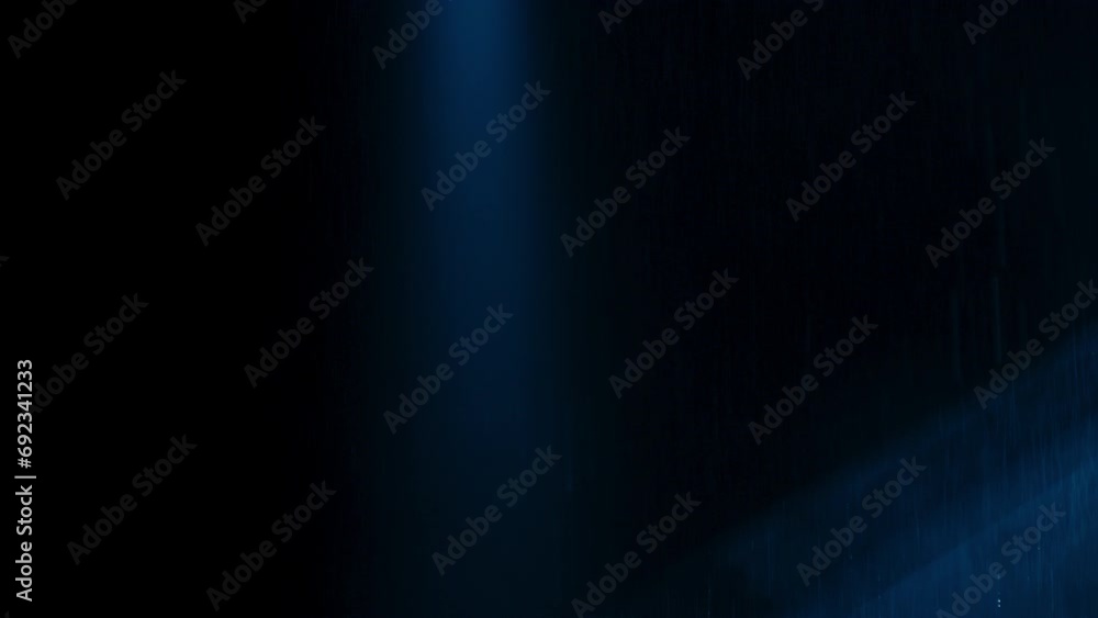 Abstract dark background with blue cold flashing light beam spot and ...