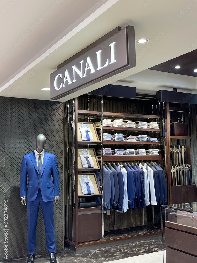 Brand Canali store in shopping mall. Luxury Italian clothing trademark. High-end men's suits ...