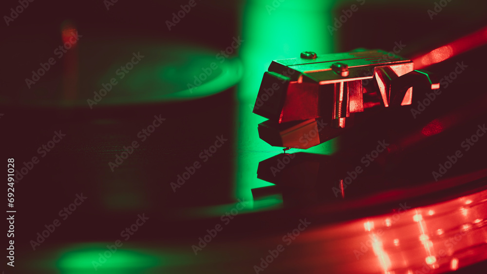 turntable needle in vinyl groove with selective focus, vintage ...