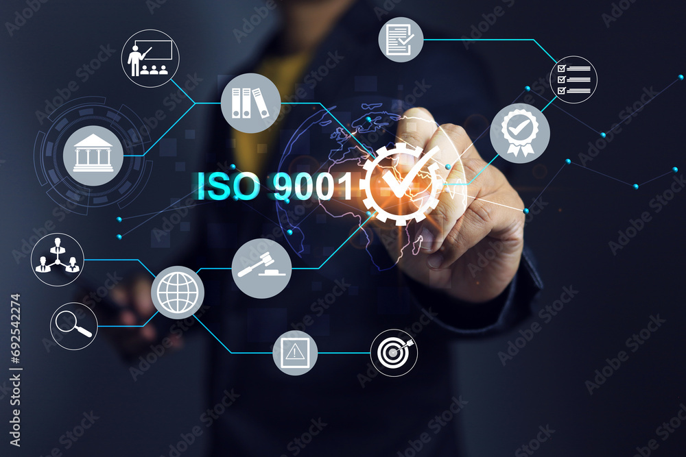 ISO 9001 Quality assurance standardization concept with businessman ...