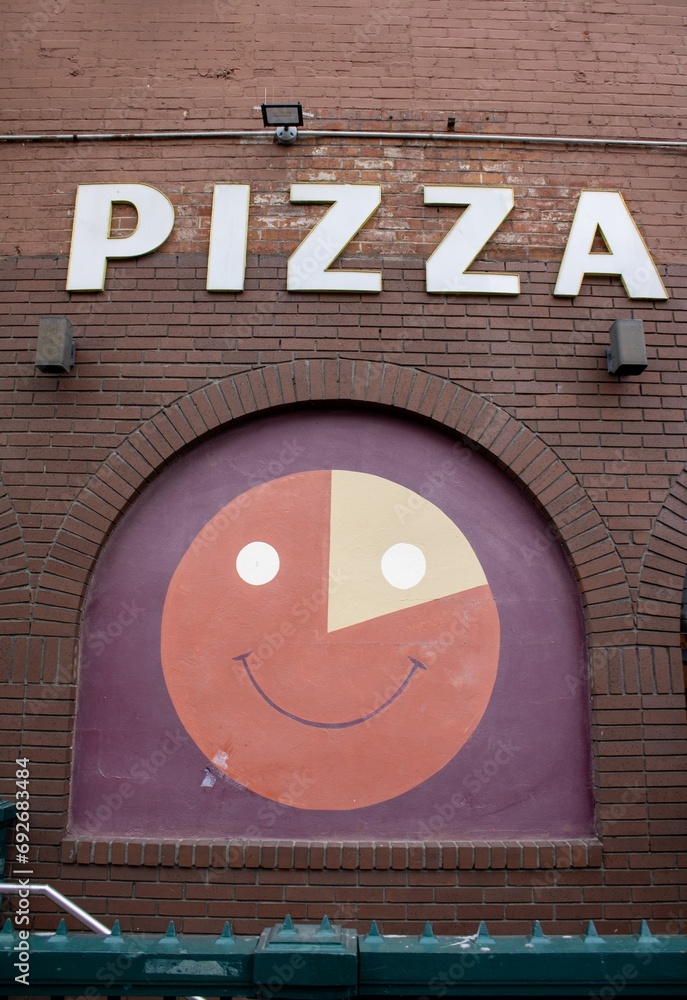the entrance to a pizza restaurant on the corner of a street, Brooklyn ...