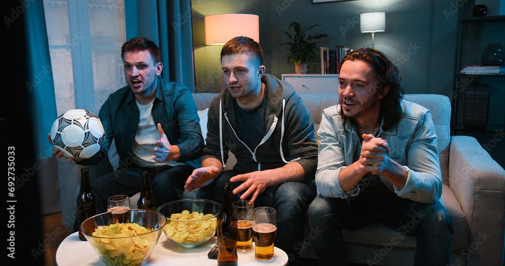 Caucasian three men best friends resting together late in evening on ...