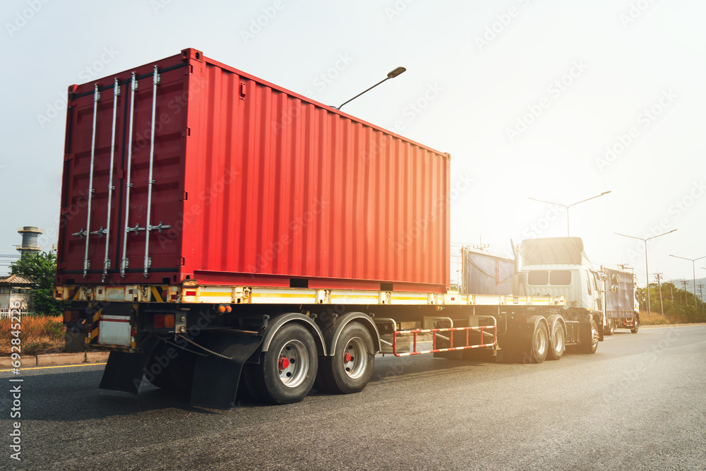 Trailer Trucks Driving on Highway Road. Cargo Container Shipping ...