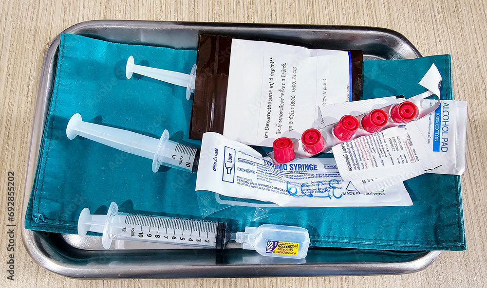 Medical equipment. Medicine, Syringes of Normal saline solution (NSS ...