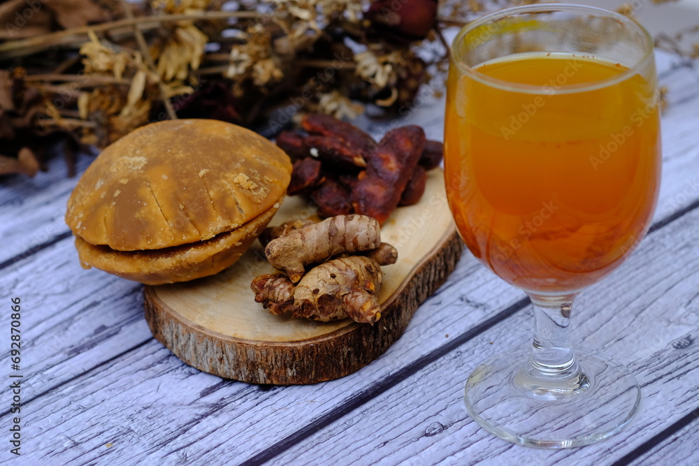 Jamu Kunir Asem is is a traditional Javanese herbal drink made from ...