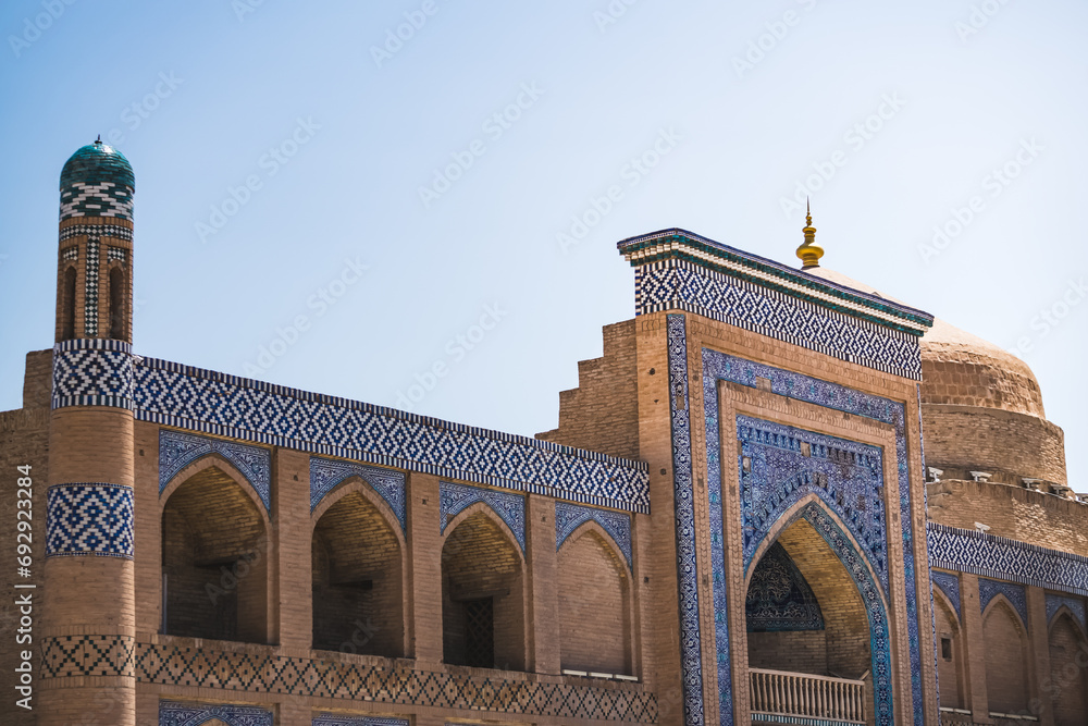 Islam Khoja Madrasah in the ancient city of Khiva in Khorezm, facing ...