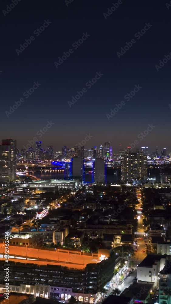 Illuminated Urban Skyline of Miami Beach and Miami Downtown at Night ...