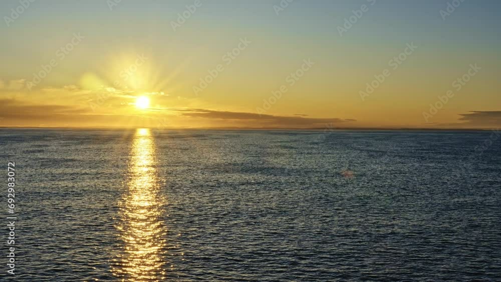 Sunrise at sea from sundeck of cruise ship side view. Morning sun ...
