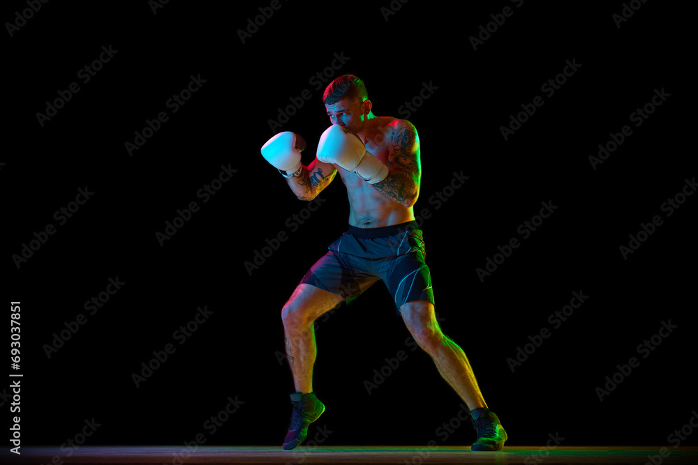 Full-length of shirtless young man with muscular strong body, boxer in ...