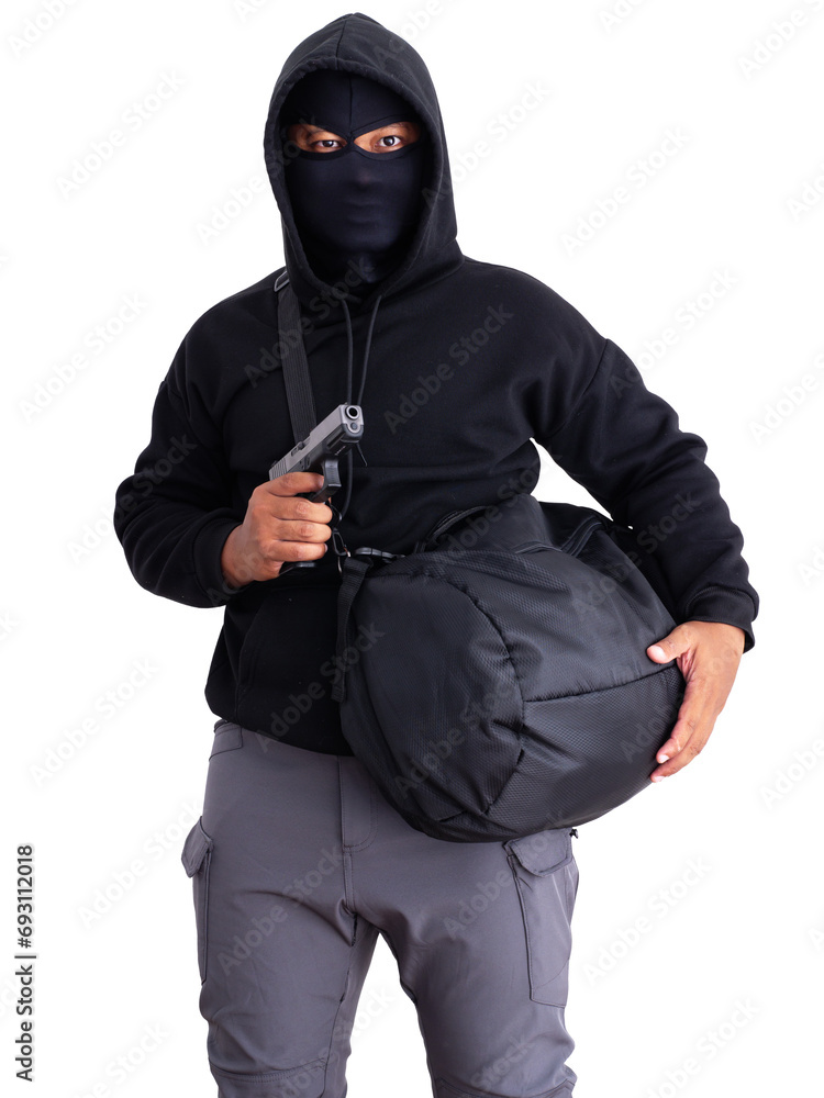 An unidentified male criminal wearing a black hoodie and covering his ...