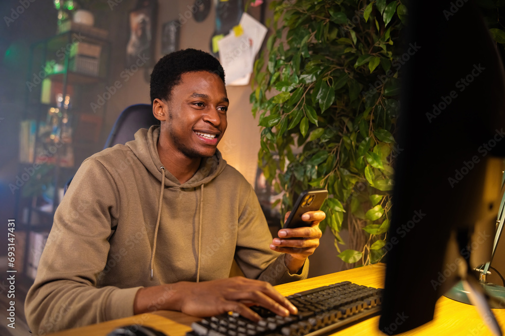 Happy delighted African American dark skinned man social media ...