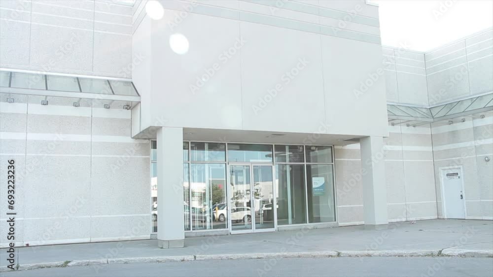 vacant generic empty store storefront beige white clean with no sign or ...