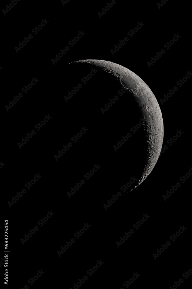 Crescent moon photographed with a telescope, where you can see the ...