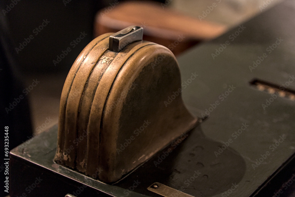 coin slot in old subway turnstile detail (macro photo of antique fare ...