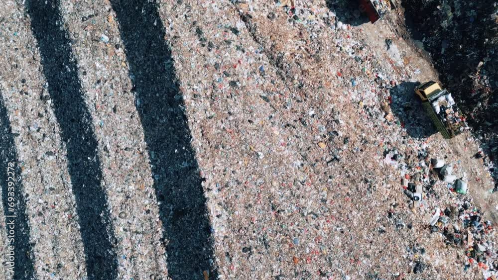 Large Waste Dump and Trash Truck with Garbage in Aerial Top View. Big ...