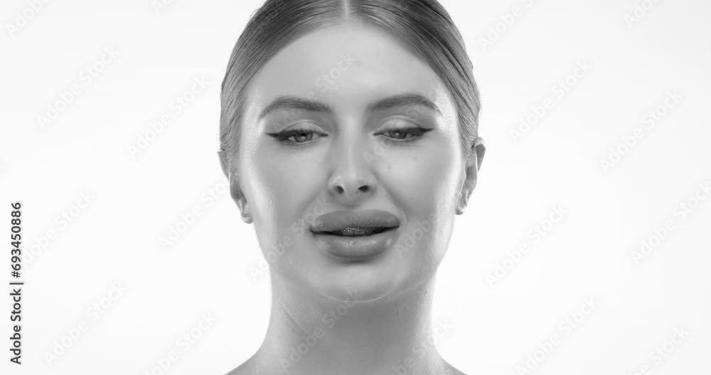 Close Up Of A Girl In A Black And White Image Making A Kissing Gesture With Her Lips Showcasing