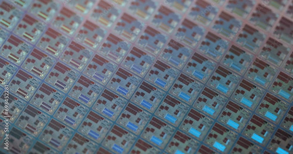 Macro Shot of a Silicon Wafer with Computer Chips during Manufacturing ...