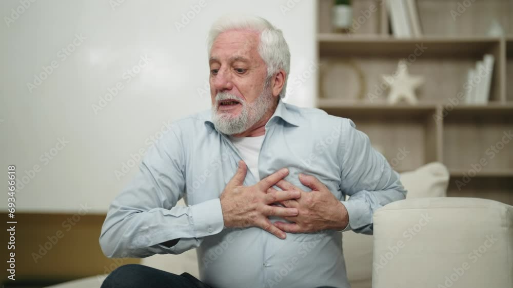 Senior man suffers from heartache. Man has heart attack, seizure ...