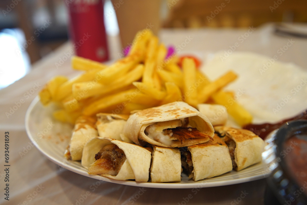 Chicken shawarma the traditional Middle Eastern dish serving with ...