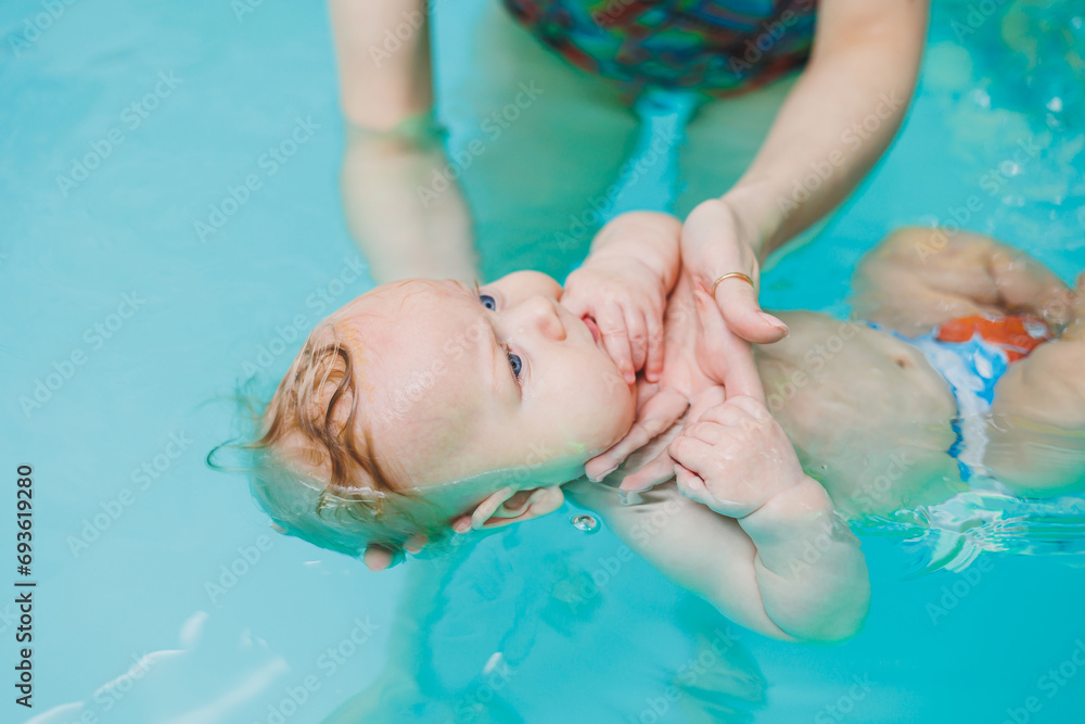 Poster Teaching children to swim – Wall Art | UkPosters