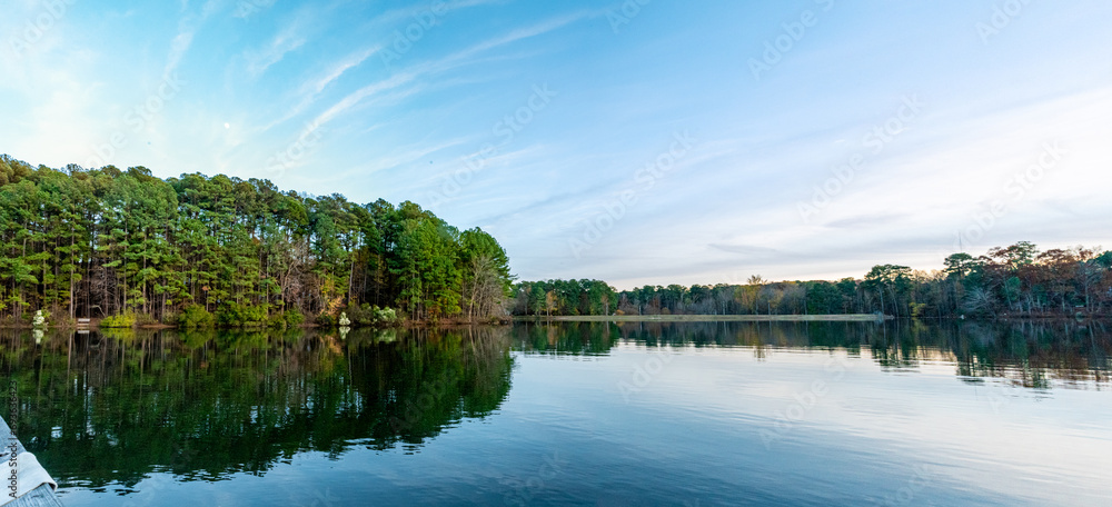 Find your sanctuary in this breathtaking panorama of an emerald lake ...