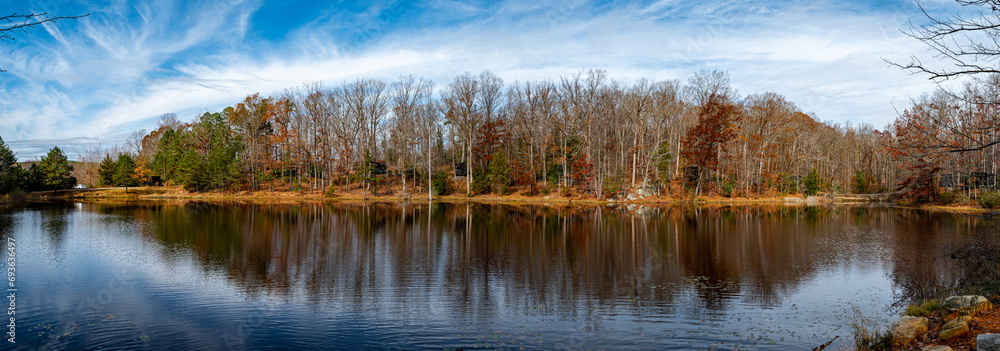 Find your sanctuary in this breathtaking panorama of an emerald lake ...