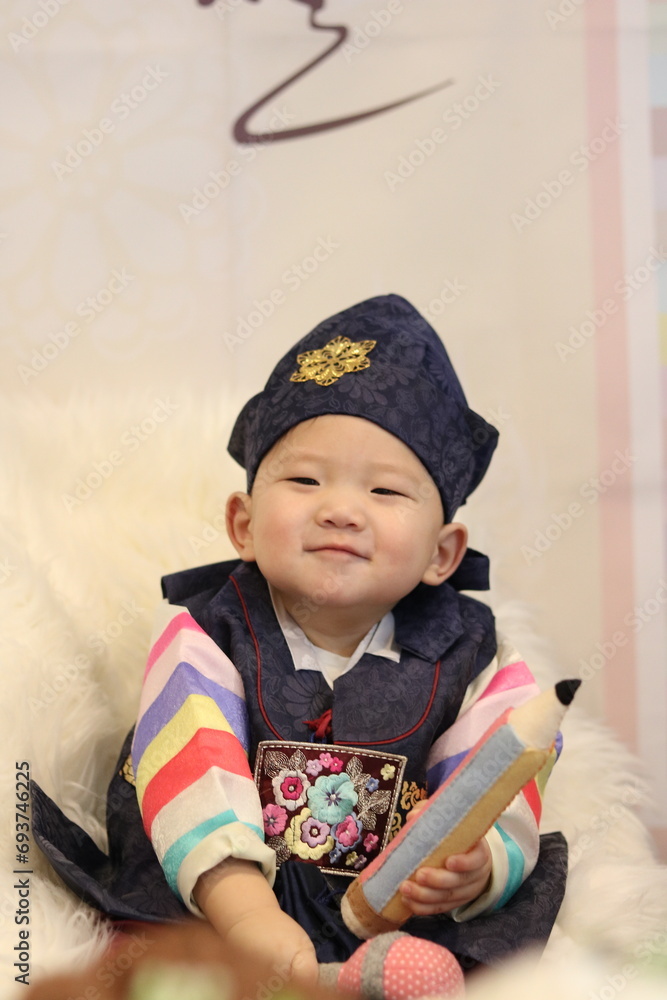 Celebrating Korean traditional 1st year birthday party with a grand ...