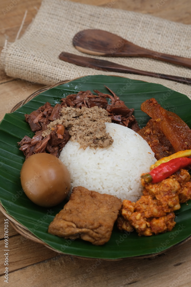 Nasi Gudeg Krecek is rice and gudeg, which is made from processed young ...