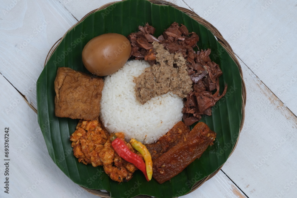 Nasi Gudeg Krecek is rice and gudeg, which is made from processed young ...