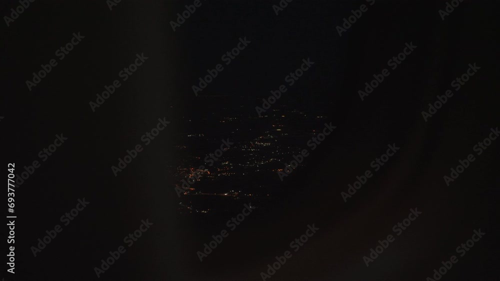 Airplane take off over night sky city lights, view from window sit ...
