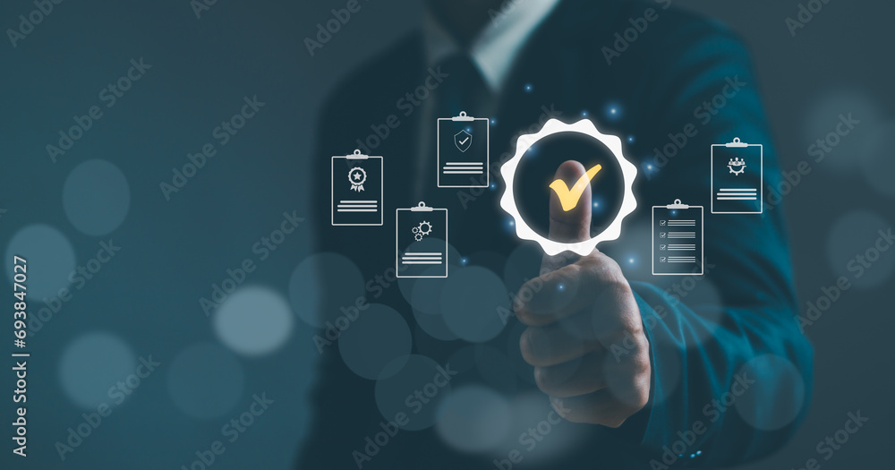 Businessman thumbs up showing quality assurance virtual graphic with ...