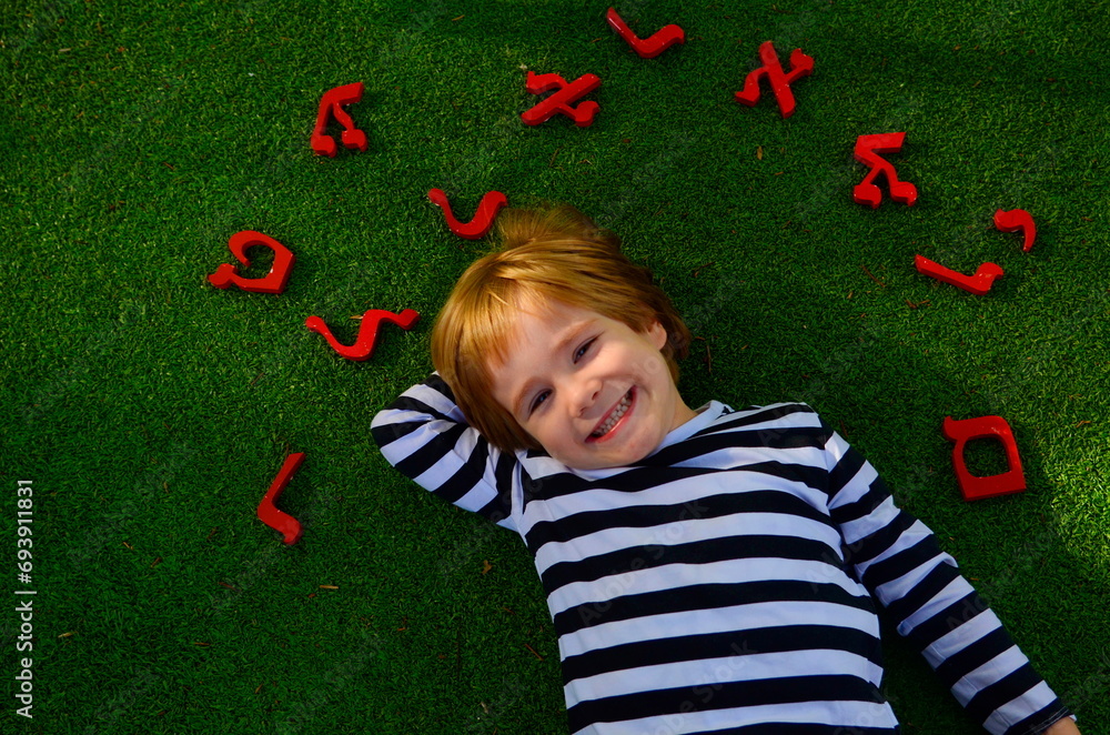 Letters of the Hebrew alphabet. A boy learns Hebrew. Ulpan for children ...