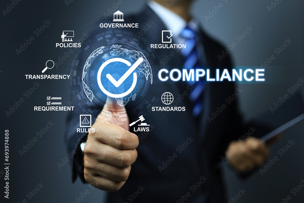 Compliance concept with businessman thumb up checkmark to applied standard and regulation for ...