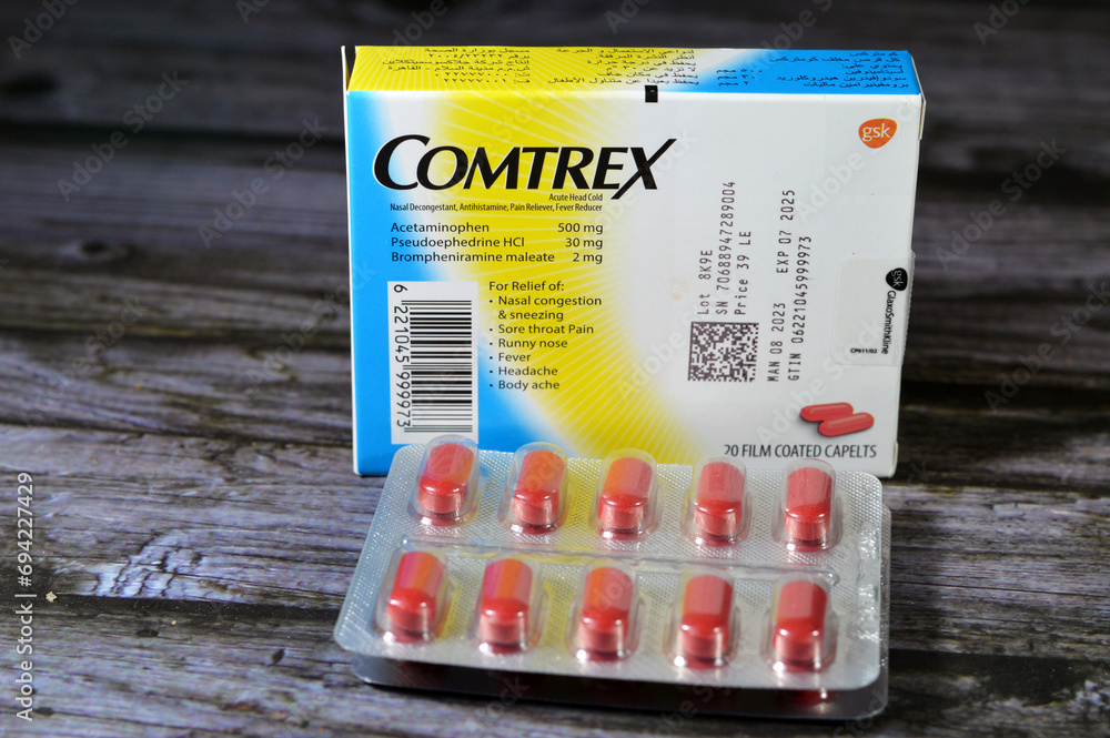 Cairo, Egypt, December 15 2023: Comtrex film coated capelts, acetaminophen, pseudoephedrine HCL ...