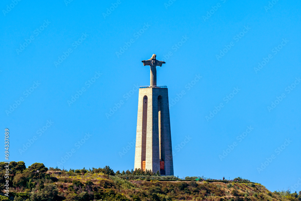 Monumental stone statue of Christ the King Almada of Lisbon (Christus ...