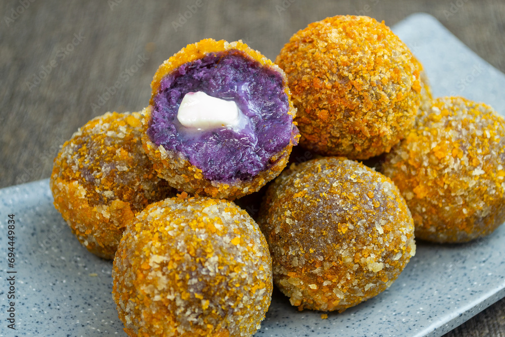 Bola-bola ubi goreng isi keju are a snack that is easily found in ...