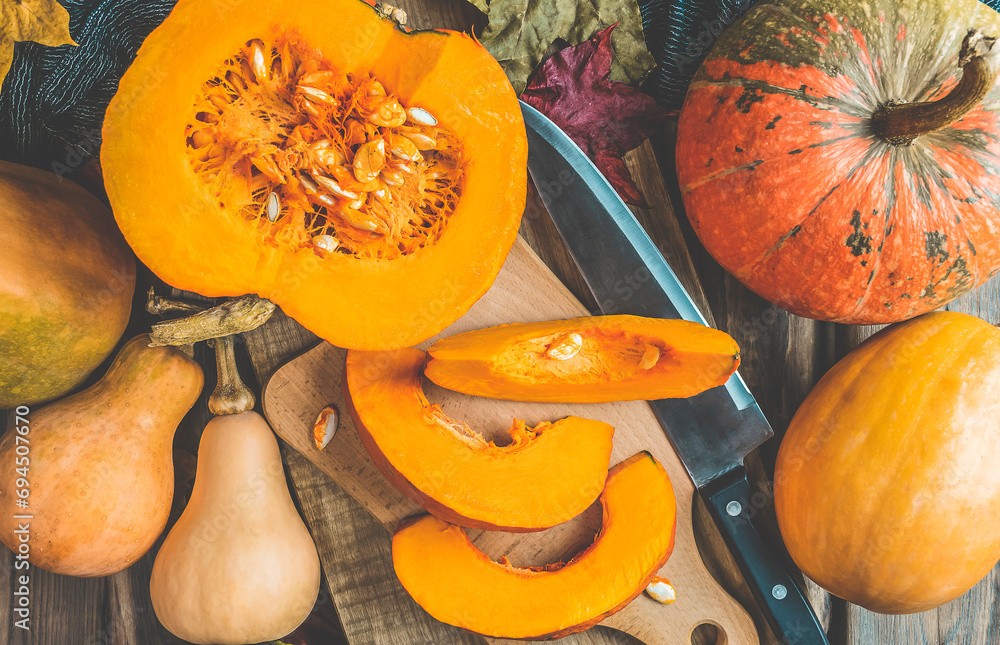 Pile of many multi colored pumpkins and gourds of different shapes and ...