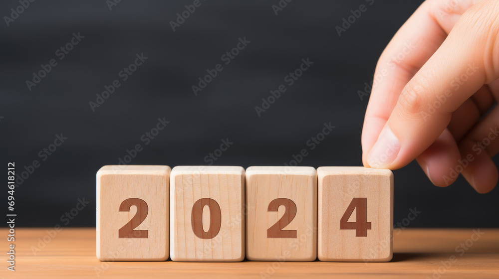 Wooden cubes bearing the numbers "2024" – a conceptual representation ...