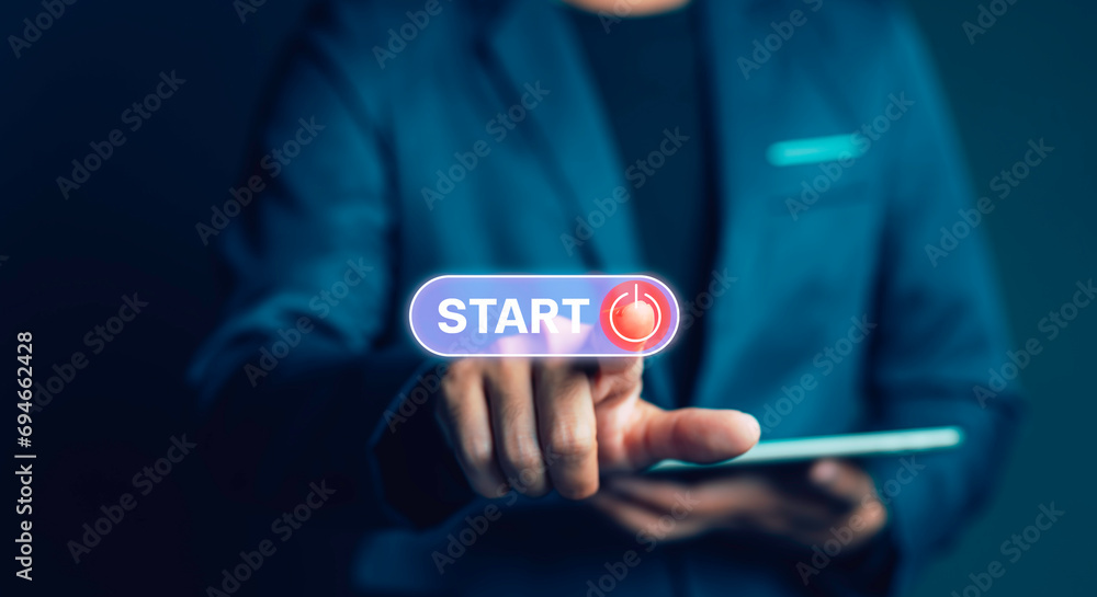 Man pressing start button annual business plan and digital business ...