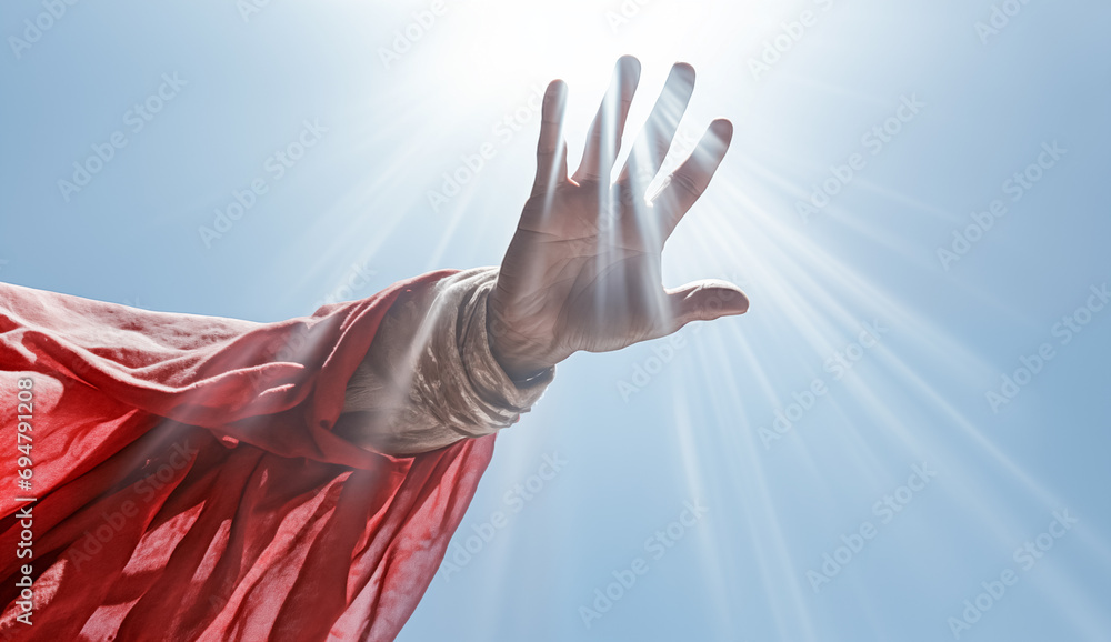 Jesus Christ reaching out his hand and praying at sunset. concept Holy ...
