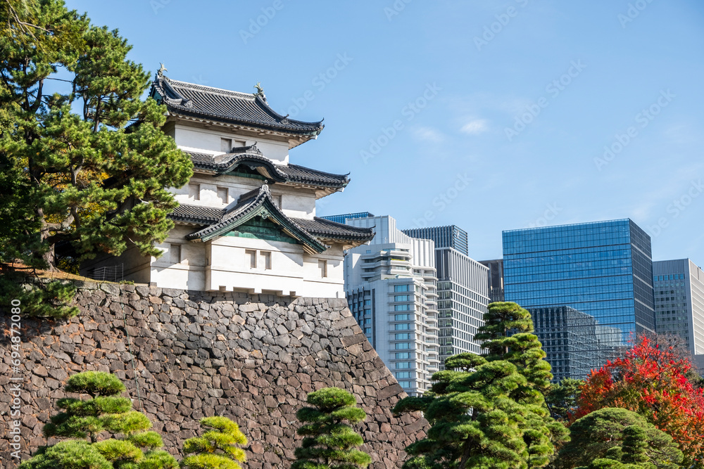 Fujimi-yagura guard tower in the Imperial Palace of Tokyo and modern ...