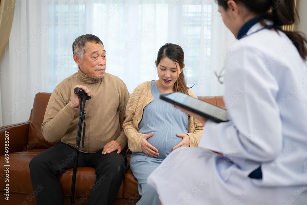 Father and daughter pregnant woman visit gynecologist doctor at medical ...