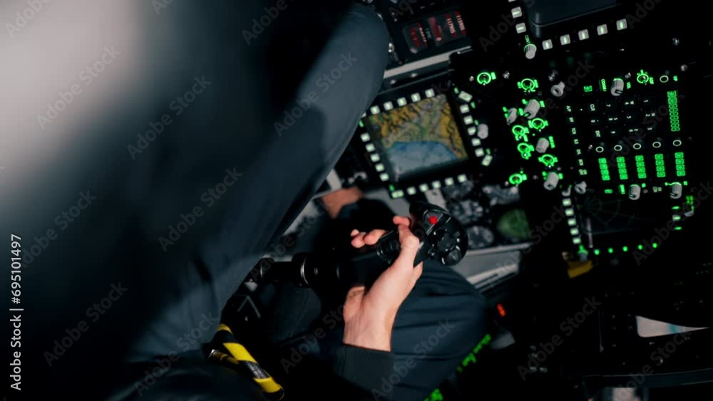 vertical video close-up of the cockpit of a military plane a pilot with ...