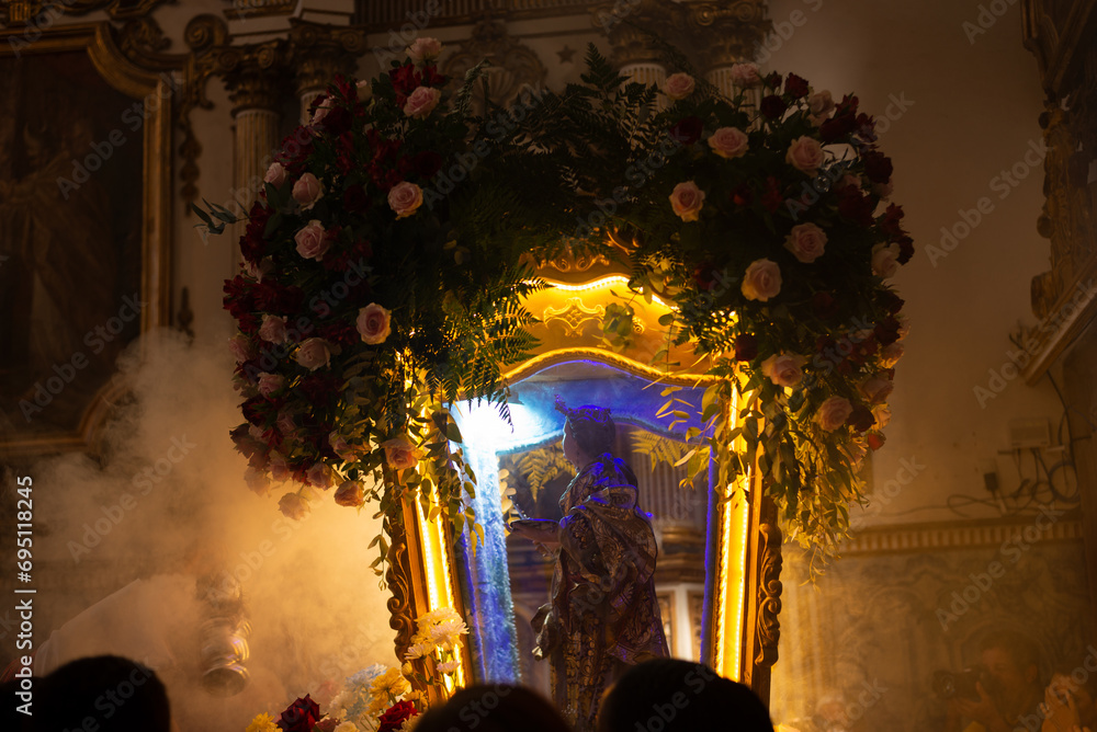Statue of Santa Luzia is displayed during mass at Pilar Church in the ...