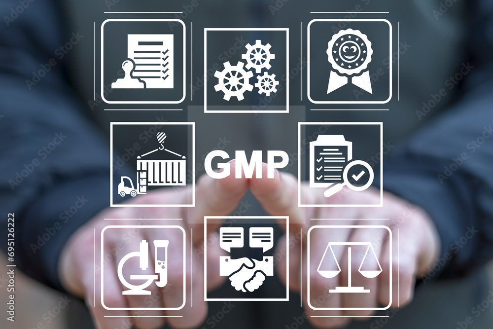 Man using virtual touch screen presses acronym: GMP. Good Manufacturing ...