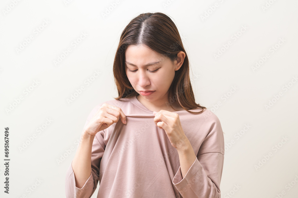 Bad smelling, deodorant asian young woman smell stink, breathing nose ...