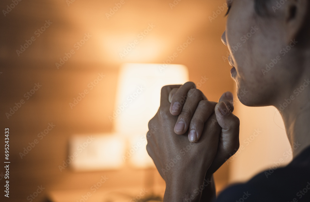 Christian woman praying in bedroom, woman hands praying to god, begging for forgiveness and ...