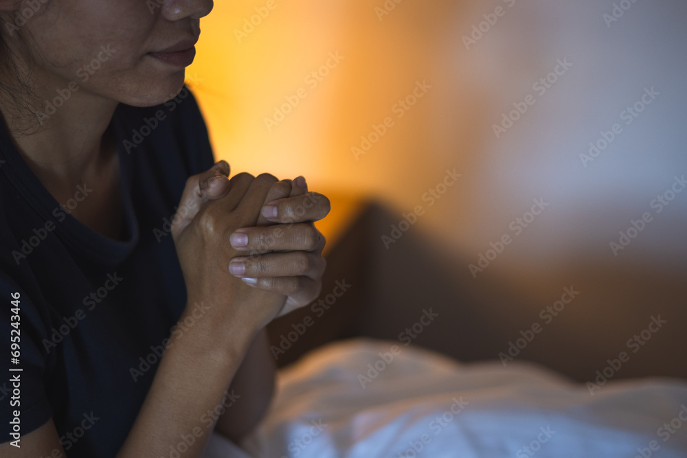 Christian woman praying in bedroom, woman hands praying to god, begging for forgiveness and ...