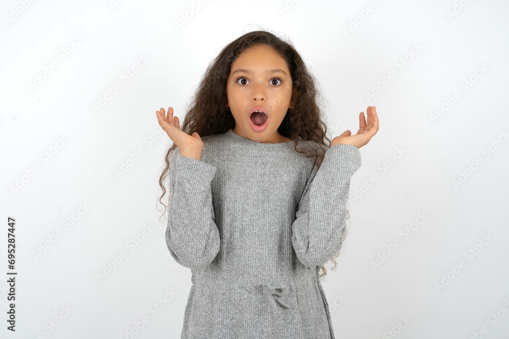 Surprised terrified Beautiful teen girl wearing grey dress Gestures ...