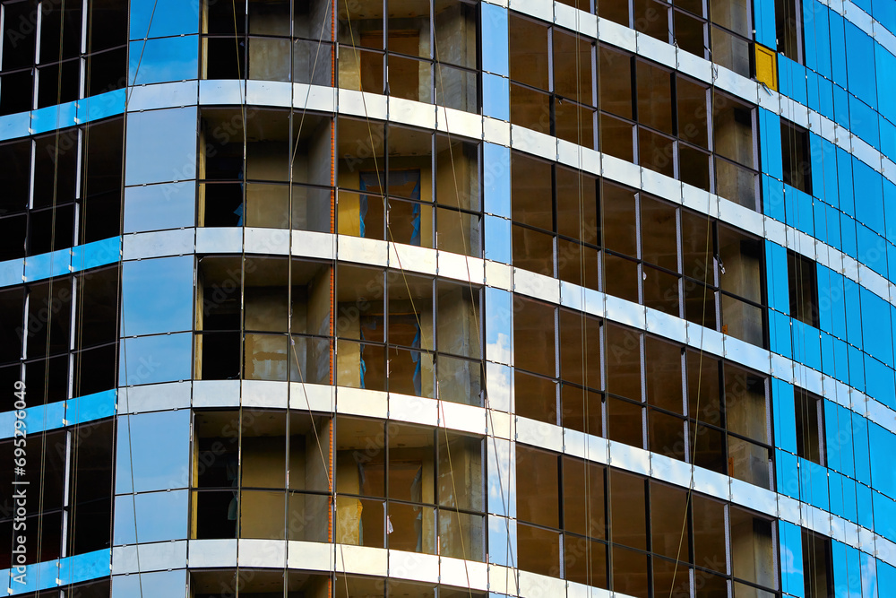 Install double glazed window on high-rise building. Building ...